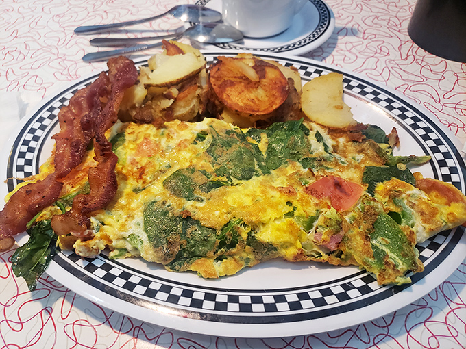 This isn't just an omelet&mdash;it's a garden folded into fluffy eggs, with spinach and cheese creating a breakfast that makes you feel virtuous while tasting decadent.