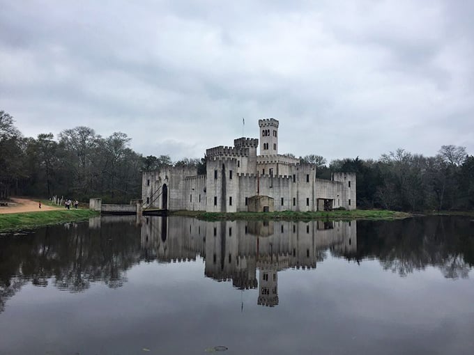Moody skies create a dramatic backdrop for this fairytale fortress. Even on cloudy days, the castle's reflection in the moat is pure magic.