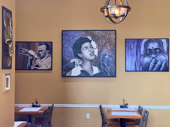 The wall art pays homage to jazz legends, providing a soundtrack for your meal even when the restaurant is perfectly quiet.