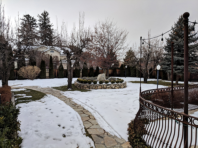 Snow blankets the grounds in pristine white, transforming summer's lush garden into a winter wonderland worthy of Narnia&mdash;minus the evil witch, hopefully.