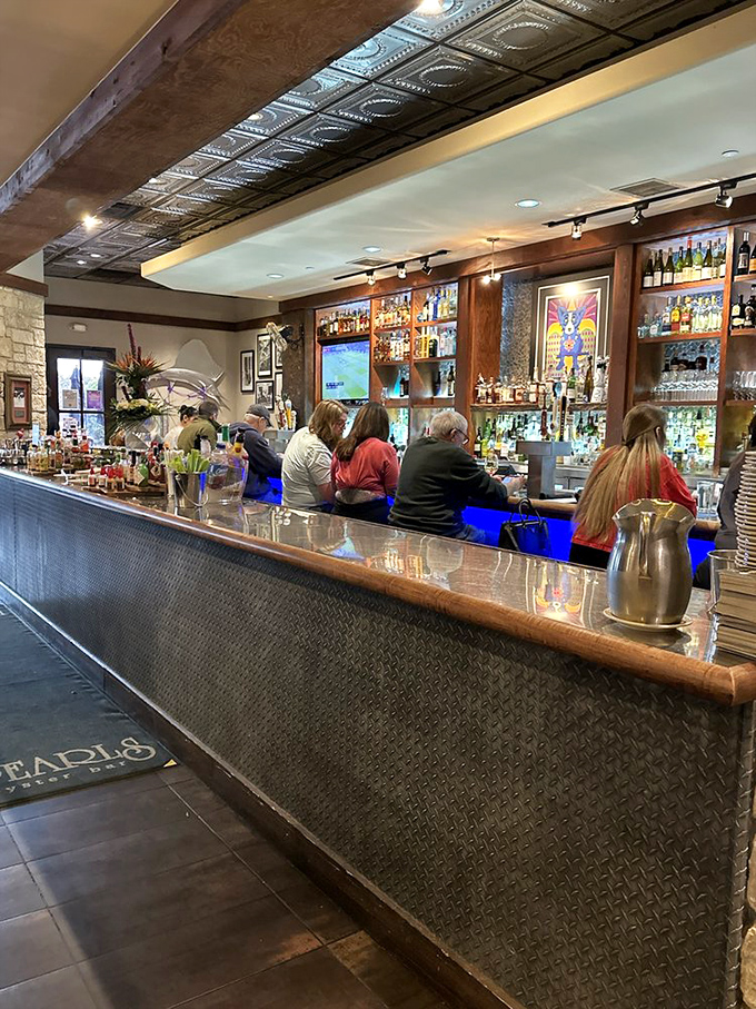 The bar at Pearl's isn't just serving drinks&mdash;it's creating liquid happiness. Those blue lights? They're setting the mood for maritime magic.