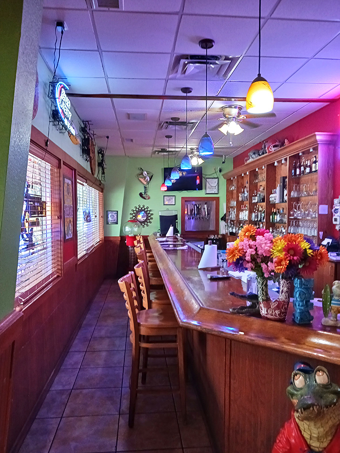 The bar area glows with warm lighting and colorful touches, promising margaritas that mean business and conversations worth remembering.