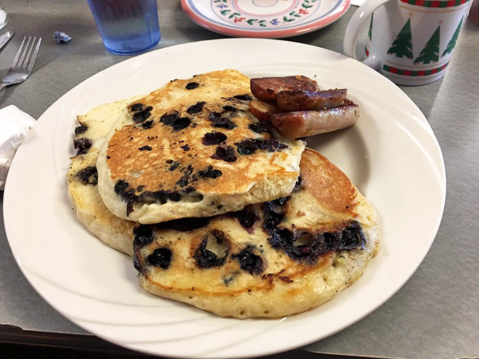 Blueberry pancakes that make you wonder why people bother with fancy brunch reservations. Simple breakfast perfection with those juicy berries baked right in.