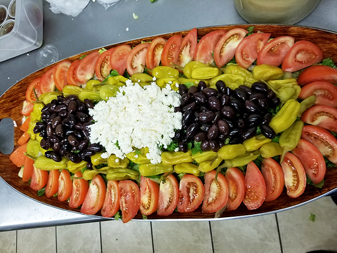 This isn't just a salad platter—it's edible art. The colors of Greece arranged with the precision of a Renaissance painting.