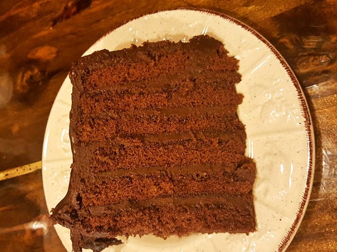 Chocolate cake so rich it should come with its own tax bracket. Those layers aren't just dessert&mdash;they're therapy.