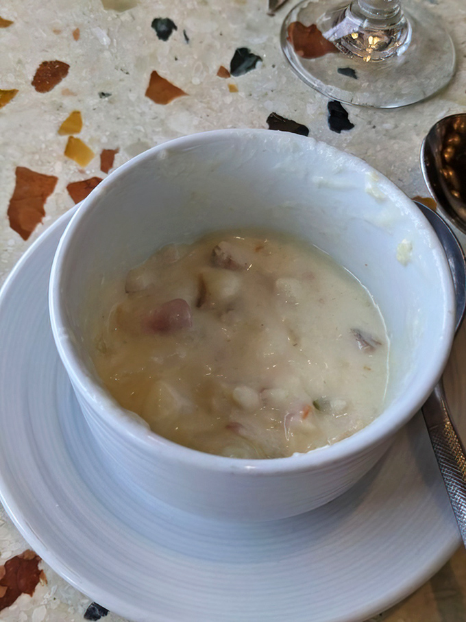 This isn't just clam chowder&mdash;it's a warm hug in a bowl, with tender chunks of clam playing hide-and-seek in a velvety sea.