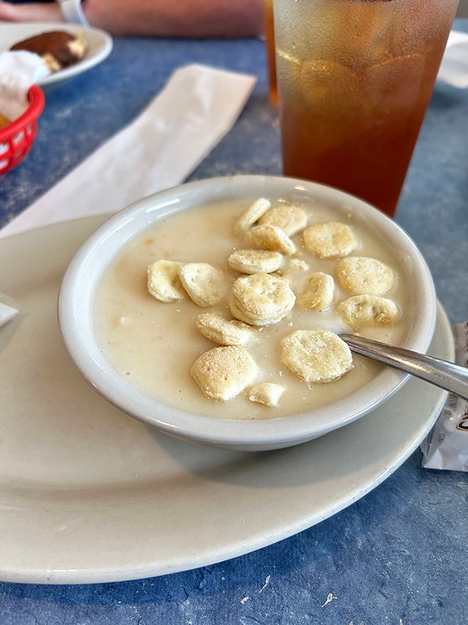 This isn't just clam chowder; it's a creamy time machine to generations of fishing families gathering around steaming bowls after a day at sea.