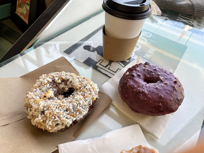 Left: Coconut meets chocolate in a textural tango. Right: The purple-hued blueberry lavender donut that makes you question why all donuts aren't this color.