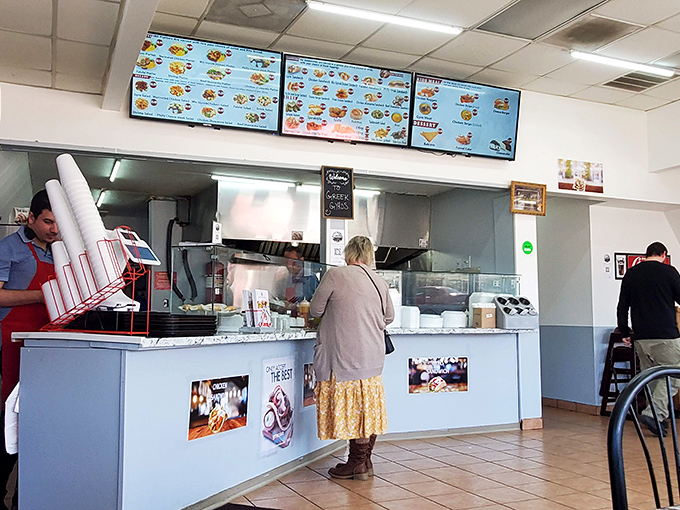 Where the magic happens! The ordering counter at Greek Gyros—simple, efficient, and the gateway to flavors that will transport you across oceans.
