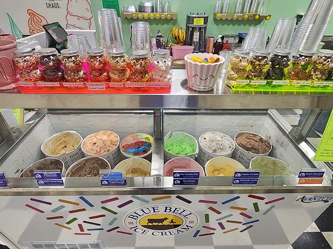 Behold the altar of frozen delight! Blue Bell flavors lined up like colorful soldiers ready to battle your boring day.