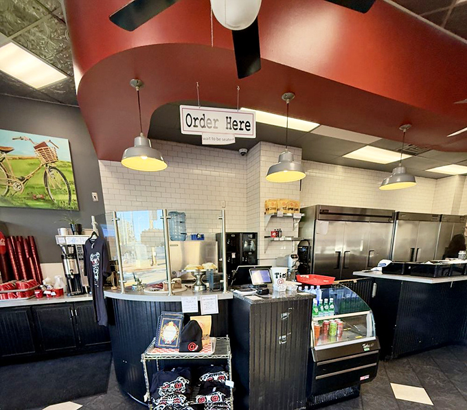 The "Order Here" sign hangs above a counter that's seen thousands of breakfast dreams come true. Culinary mission control.