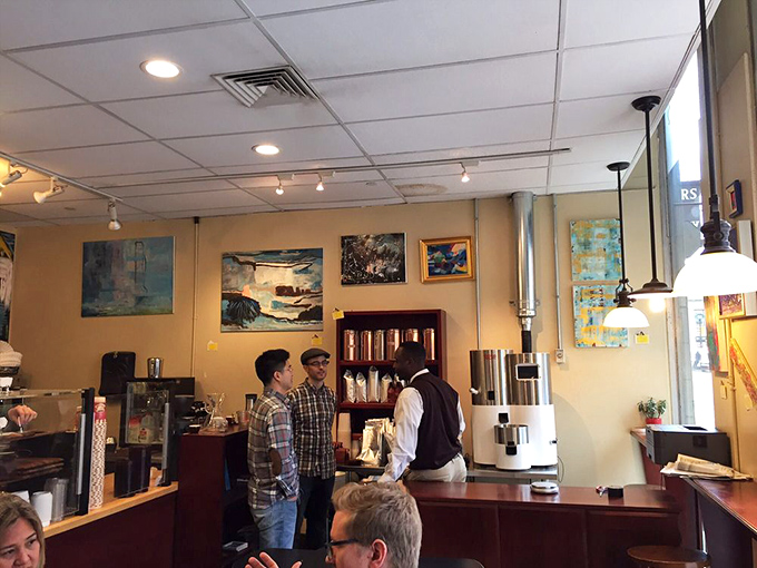 Coffee shop conversations happening exactly as they should &ndash; animated, caffeinated, and completely in the moment rather than buried in screens.