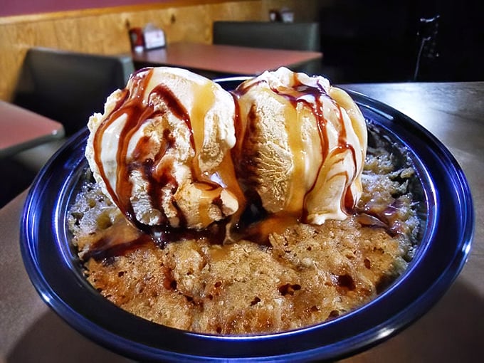 Dessert that understands its mission&mdash;providing the perfect sweet finale to a smoky symphony. Ice cream melting into warm cobbler is poetry in motion.