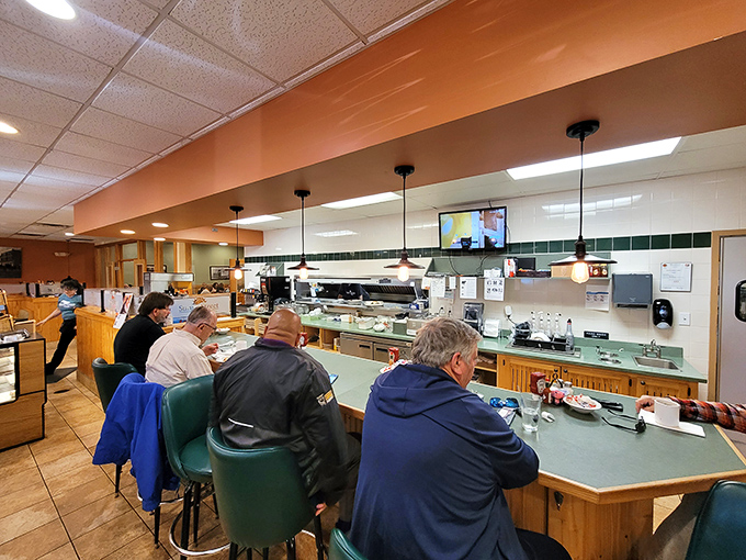 The counter seating isn't just efficient&mdash;it's breakfast theater with front-row tickets to the sizzle and flip show that makes morning meals magical.