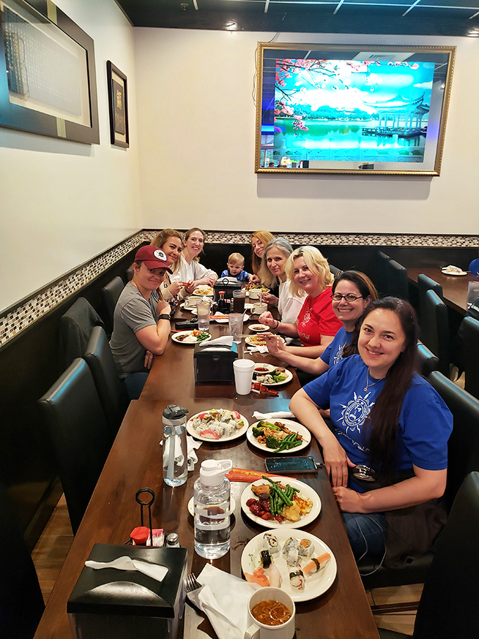 Nothing says "we approve" like a table full of happy diners with plates that tell stories of multiple trips to the buffet line. Community through cuisine.