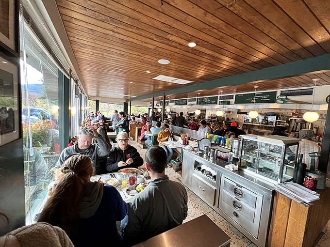 Where strangers become friends over shared meals. The bustling interior captures that magical diner energy where conversations and coffee flow freely.