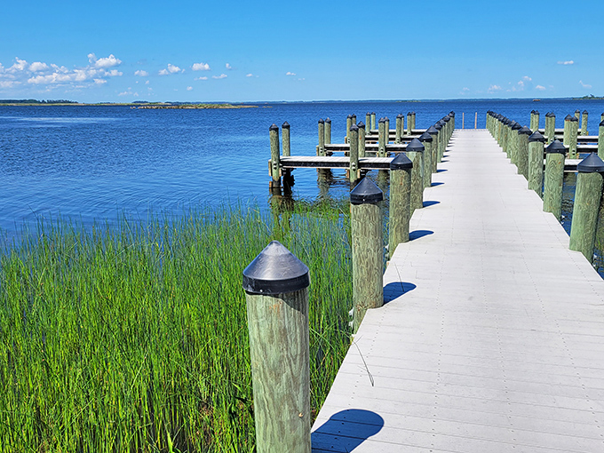 Not all docks lead to fishing boats&mdash;this one invites contemplation of Back Bay's glassy waters and distant horizons.
