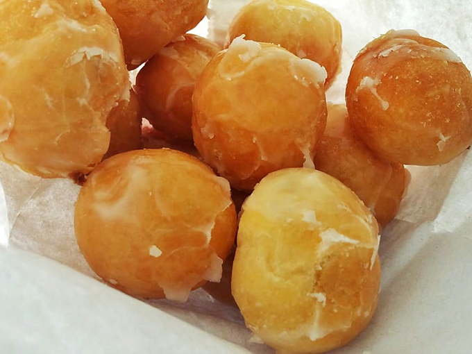 Donut holes: proof that sometimes the smallest pleasures deliver the biggest smiles, glistening with glaze and begging to be popped whole.