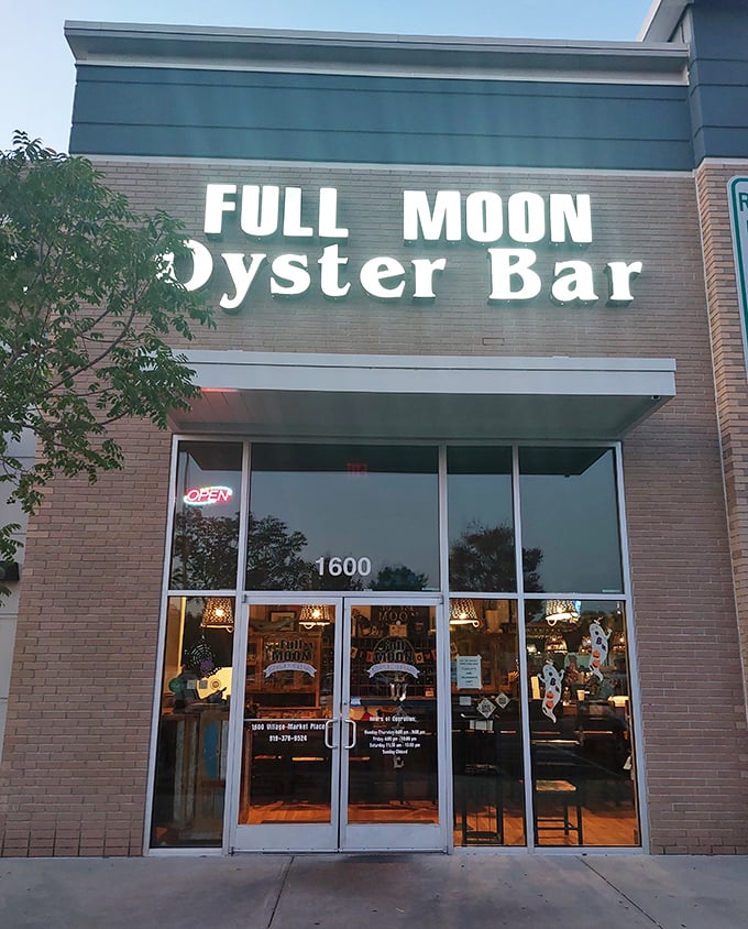 By day, it's just another storefront. By night, it's a beacon calling to seafood lovers like a lighthouse guides ships home.