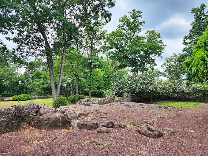 The grounds offer unexpected rocky outcroppings and flowering shrubs, creating natural "rooms" for visitors to discover around every turn.