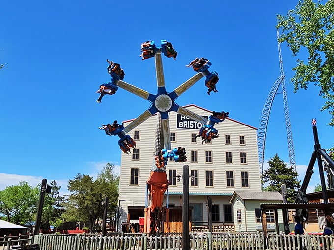 The Gunslinger ride defies gravity and common sense, spinning passengers in ways that would make even the toughest frontier sheriff reconsider his lunch choices.