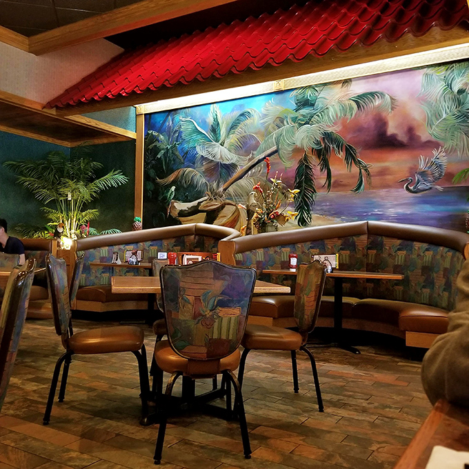 Tropical murals that transport you from coal country to coastline with just a glance. Those palm trees are working overtime on your winter blues.