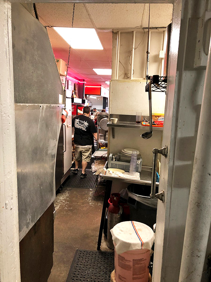 The kitchen ballet&mdash;where magic happens in a space smaller than most walk-in closets, proving greatness doesn't require square footage.