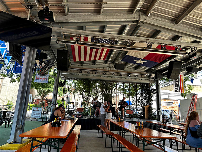 Under Texas and American flags, the biergarten becomes a United Nations of beer lovers where the universal language is "Mmm" and "Another round, please."