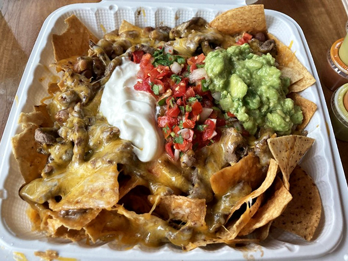 The bar area: where tequila dreams come true and strangers become friends. Those hanging lamps cast the perfect "you look fabulous" glow.