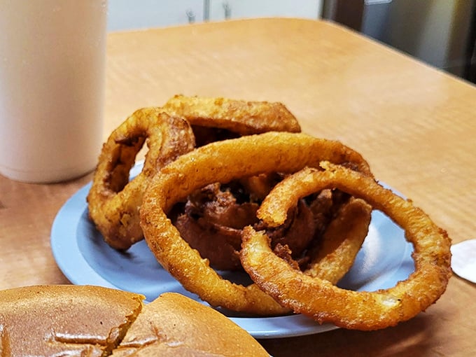 Onion rings with the structural integrity of Olympic gold medals&mdash;crispy, substantial, and demanding to be dunked in ketchup or eaten straight-up in all their golden glory.
