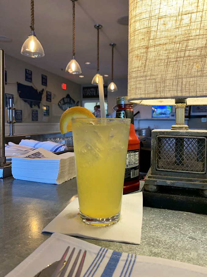 That's not just a refreshing beverage&mdash;it's liquid sunshine in a glass, with an orange slice that's basically a beach vacation garnish.