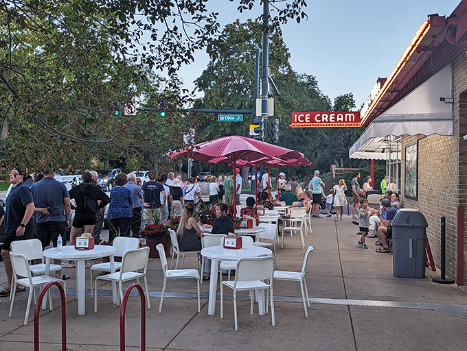 As dusk falls, Bonnie Brae's outdoor patio transforms into a community gathering spot where strangers become friends over shared ice cream euphoria.