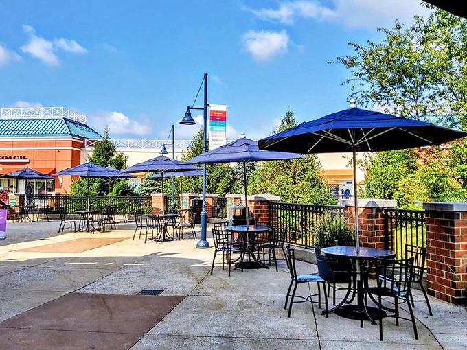Outdoor dining areas provide respite from the retail marathon, where shoppers strategize their next moves under Pennsylvania skies.