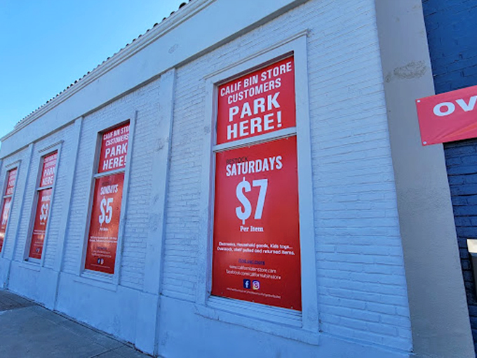 The exterior view showcasing the sliding price scale. These red window signs are basically real-life clickbait &ndash; and completely worth it.