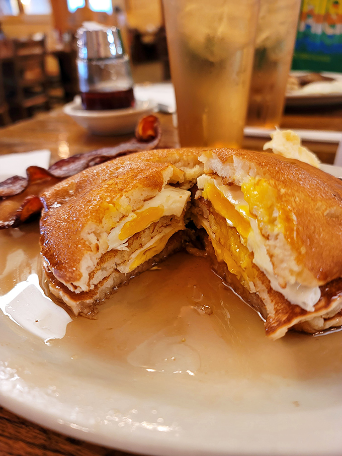 The pancake sandwich&mdash;where maple syrup creates rivers of sweetness through layers of fluffy pancake and savory filling. Breakfast engineering at its finest.