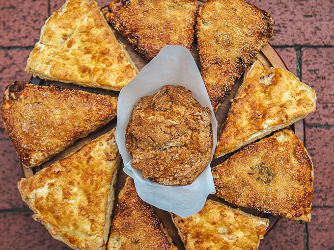 A circle of scones surrounding a cookie like planets orbiting a delicious sun. Resistance is futile.