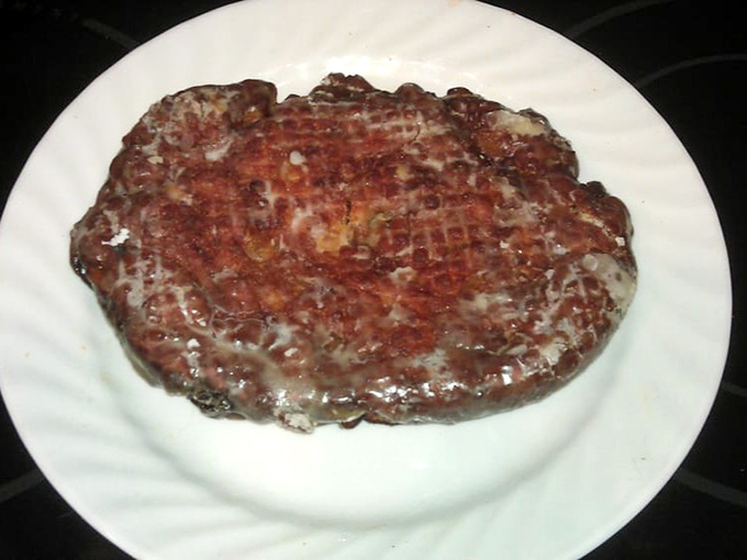 This isn't just a fritter—it's practically a personal-sized coffee cake that demands respect and possibly a fork.