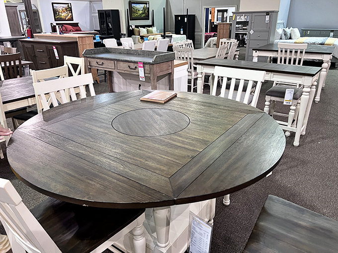 This weathered gray round dining table practically begs for Sunday family gatherings where nobody mentions politics or religion.