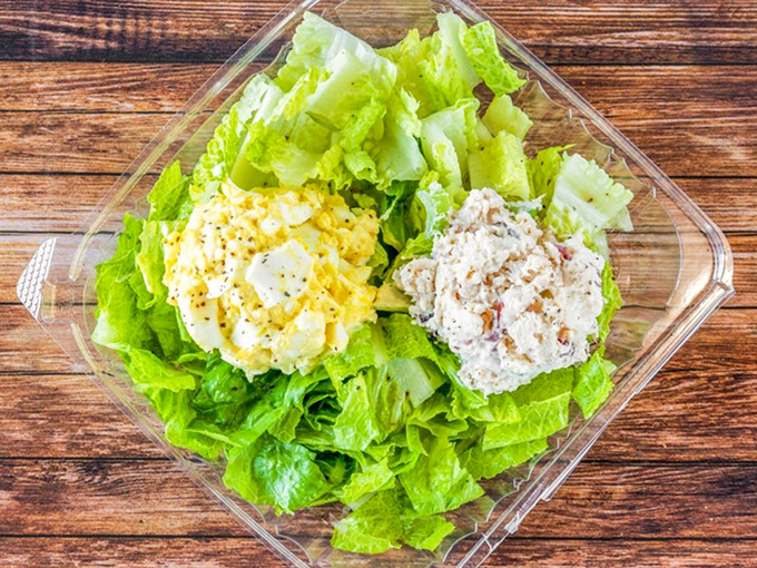 A salad that doesn't apologize for being healthy. Crisp greens playing host to egg salad and chicken salad &ndash; the Switzerland of lunch options.