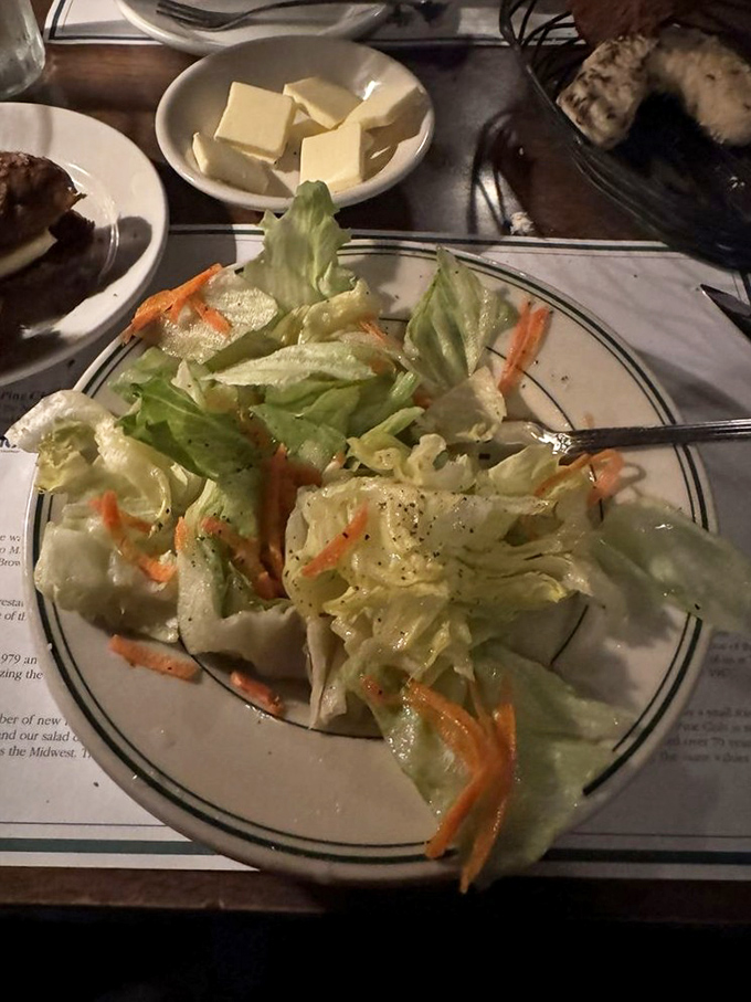 A salad at a steakhouse is like an opening act at a concert—it better be good enough to respect but not so good you forget why you came.