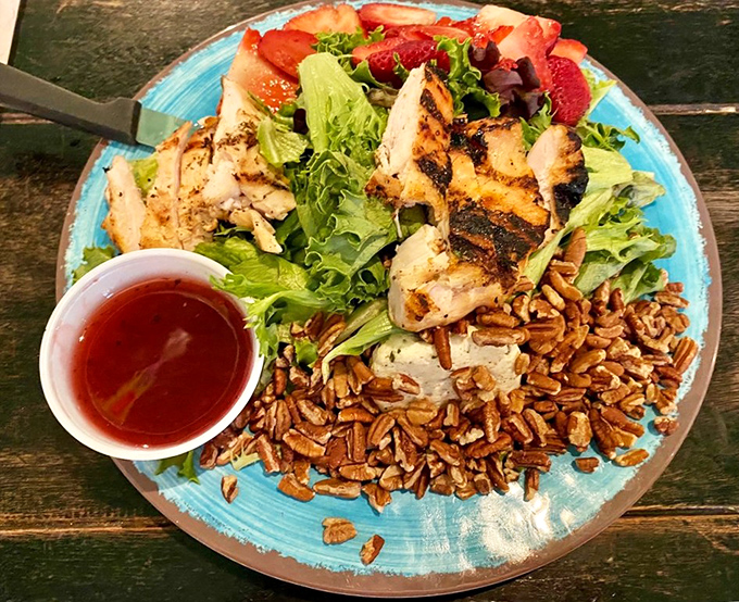 Fresh greens, grilled chicken, and candied pecans&mdash;this isn't just a salad, it's a reminder that healthy eating doesn't have to be a punishment.