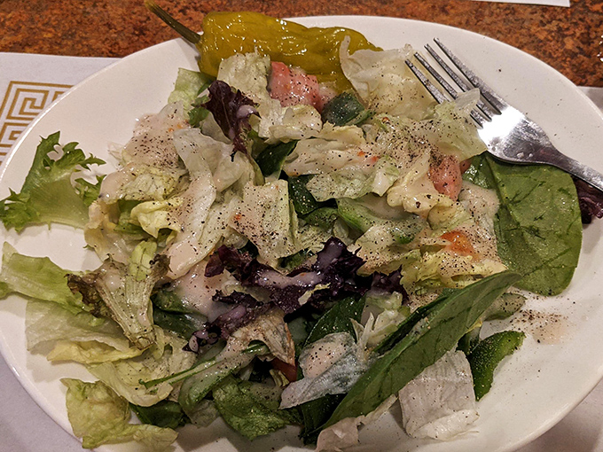 This isn't just salad&mdash;it's the supporting actor that deserves its own award for making you feel virtuous while visiting a fried fish paradise.