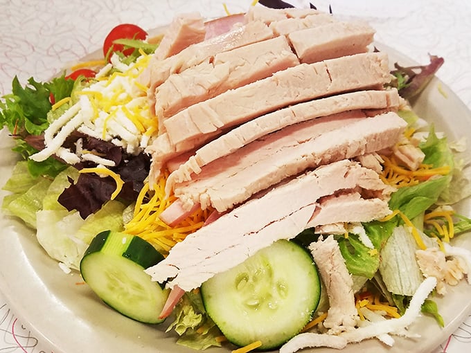 A proper diner salad doesn't apologize for being straightforward &ndash; fresh ingredients arranged with care, no food styling required.