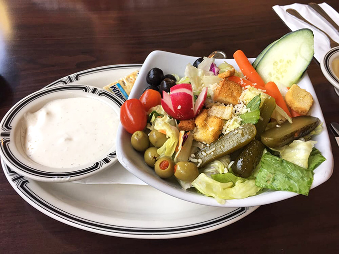 The house salad provides the illusion that you're making healthy choices, while secretly being the perfect vehicle for more Russian dressing.