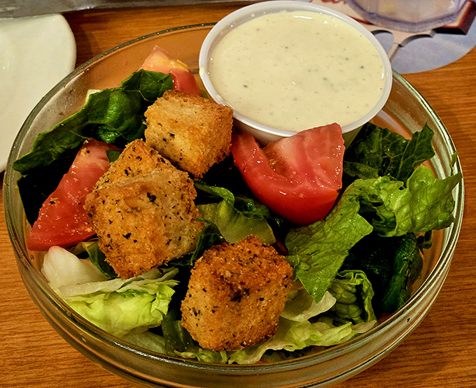 Even the side salad gets respect here&mdash;crisp greens, ripe tomatoes, and house-made croutons that crunch like they mean business.