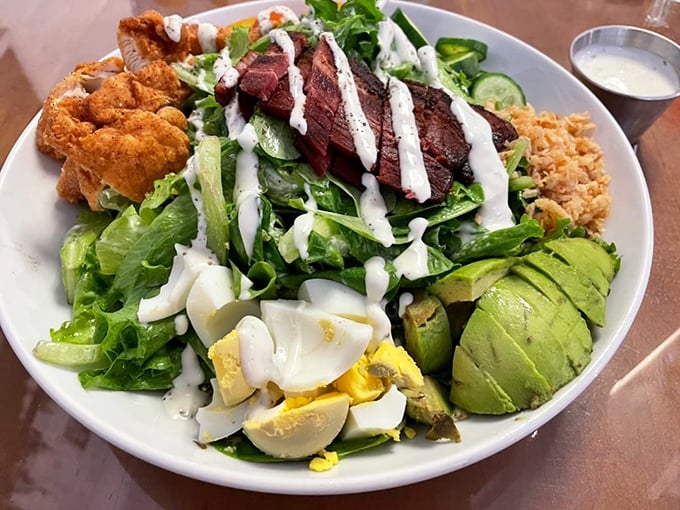 A salad substantial enough to make even dedicated carnivores reconsider their life choices, topped with perfectly seared steak.