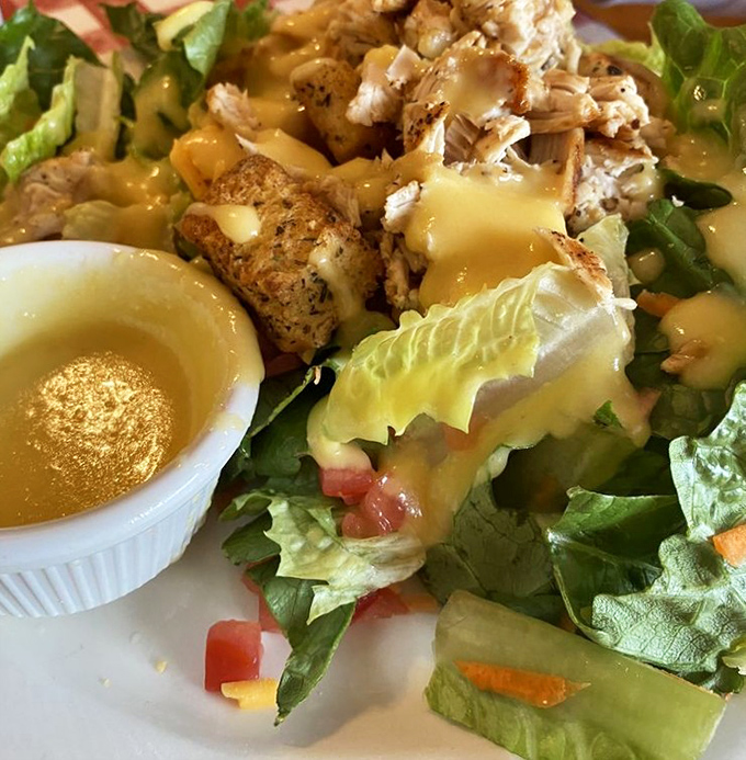 This salad is merely a vehicle for delivering perfectly seasoned chicken and honey mustard dressing to your eagerly awaiting taste buds.