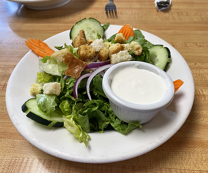 A garden-fresh salad that doesn't apologize for being healthy. The kind of side dish that makes you feel virtuous enough to order pie for dessert.