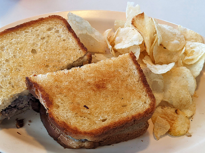 The humble sandwich elevated to art form. That perfectly golden toast isn't just cooked&mdash;it's been loved, understood, and respected.