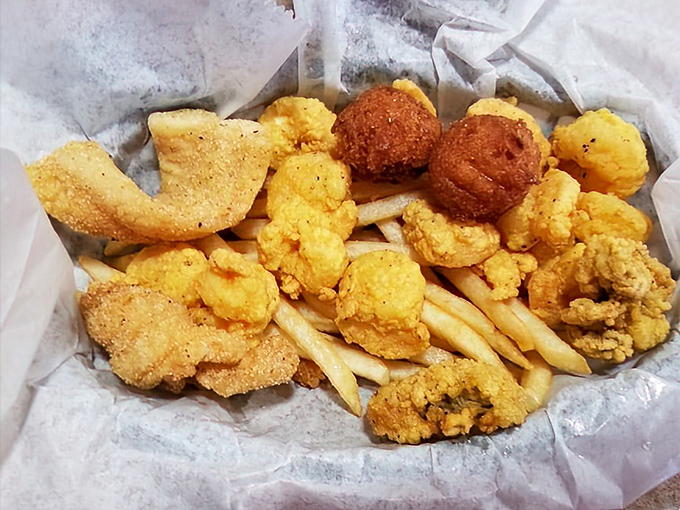 Behold the golden-fried medley that makes even seafood purists question their commitment to "simple preparation." Some things just belong in a fryer.